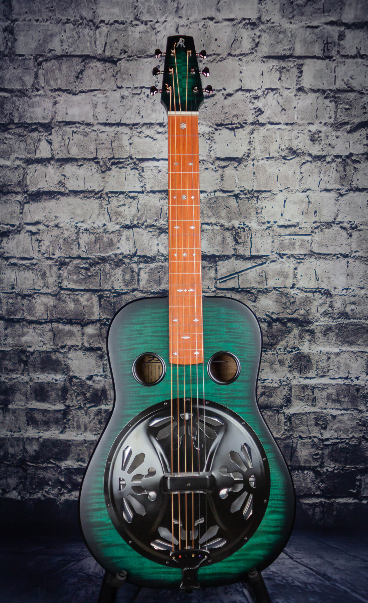 dobro guitar with rounded body edges